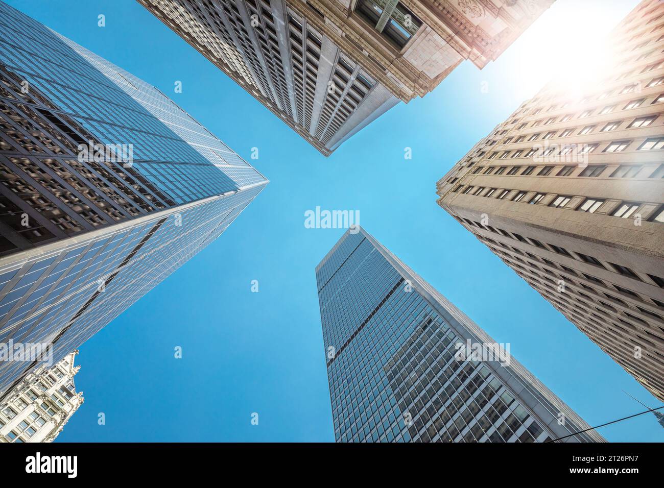 Modern glass and classic tall office buildings in New York. A ...