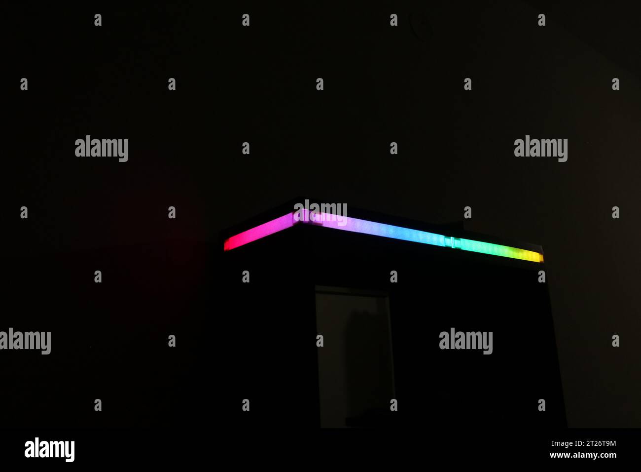 LED strip light diffused with paper that displays gradient colors on a ...
