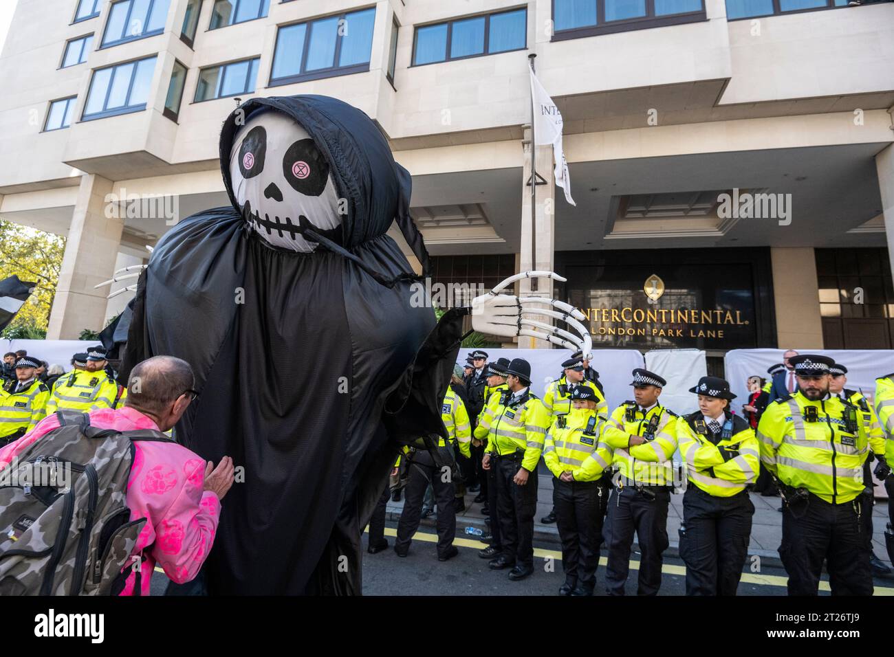 London, UK. 17 October 2023. A skeleton character joins police arriving ...