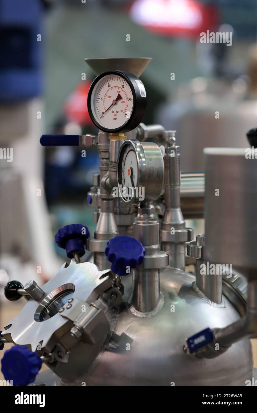 Manufacturing equipment at food production factory. Stainless steel ...