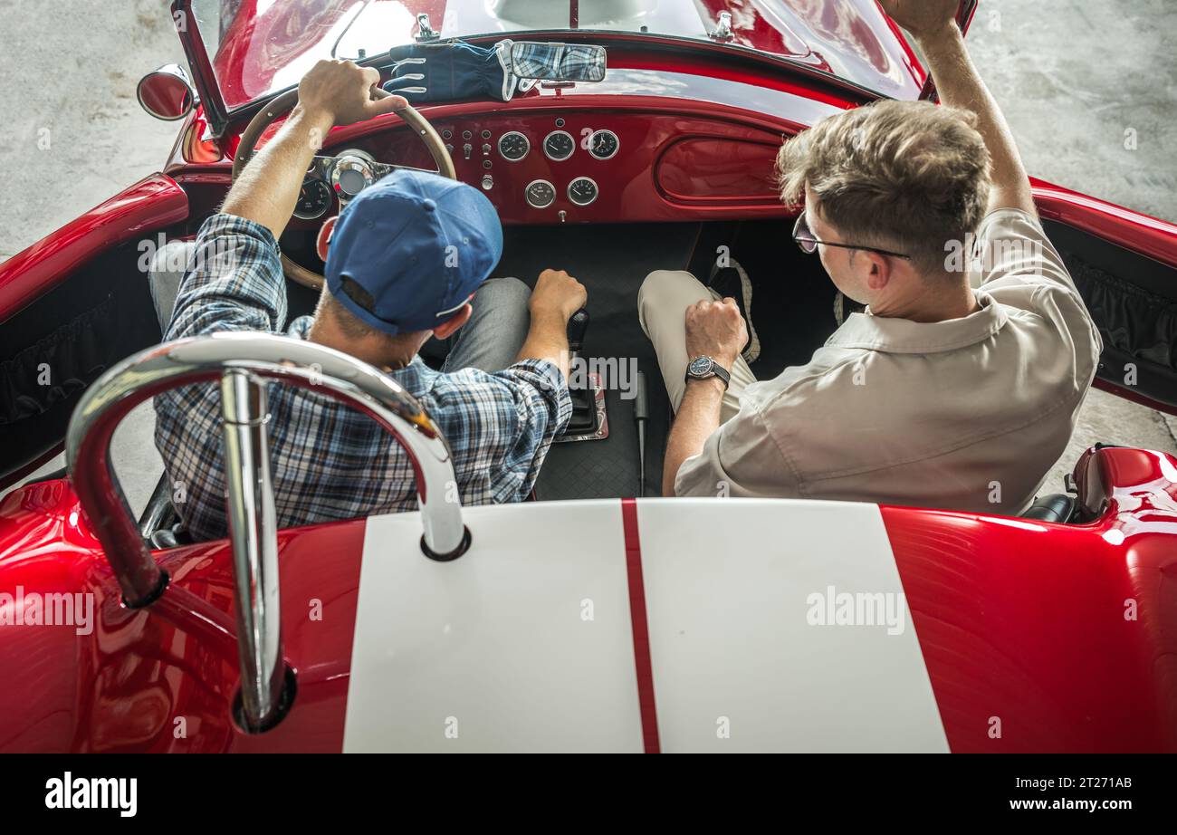 Caucasian Collectible Vehicles Owner Explaining His Car Mechanic Some ...