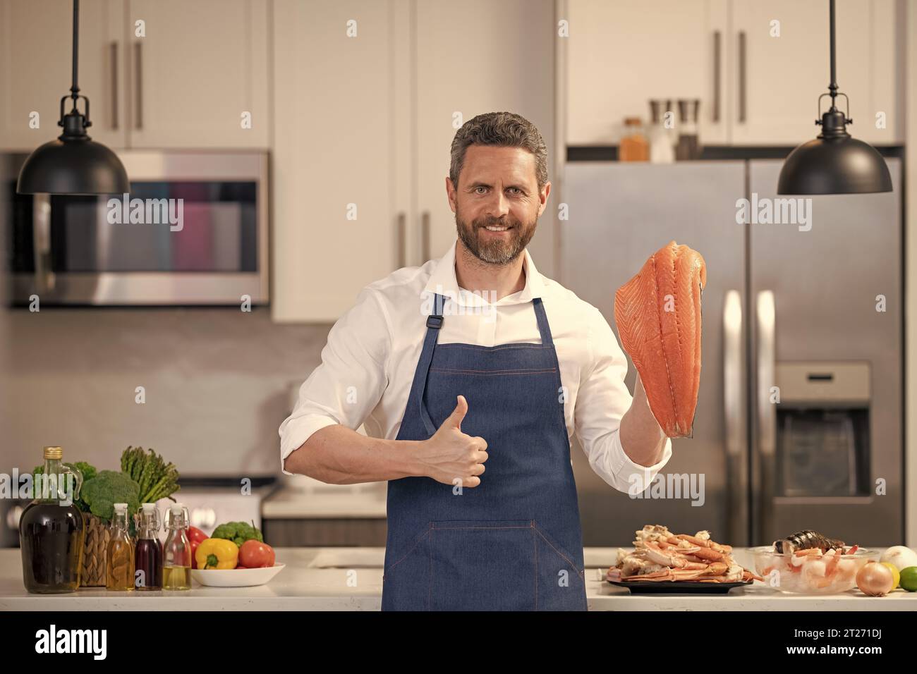 chef man cooking fish, thumb up. chef man cooking fish salmon. chef man ...