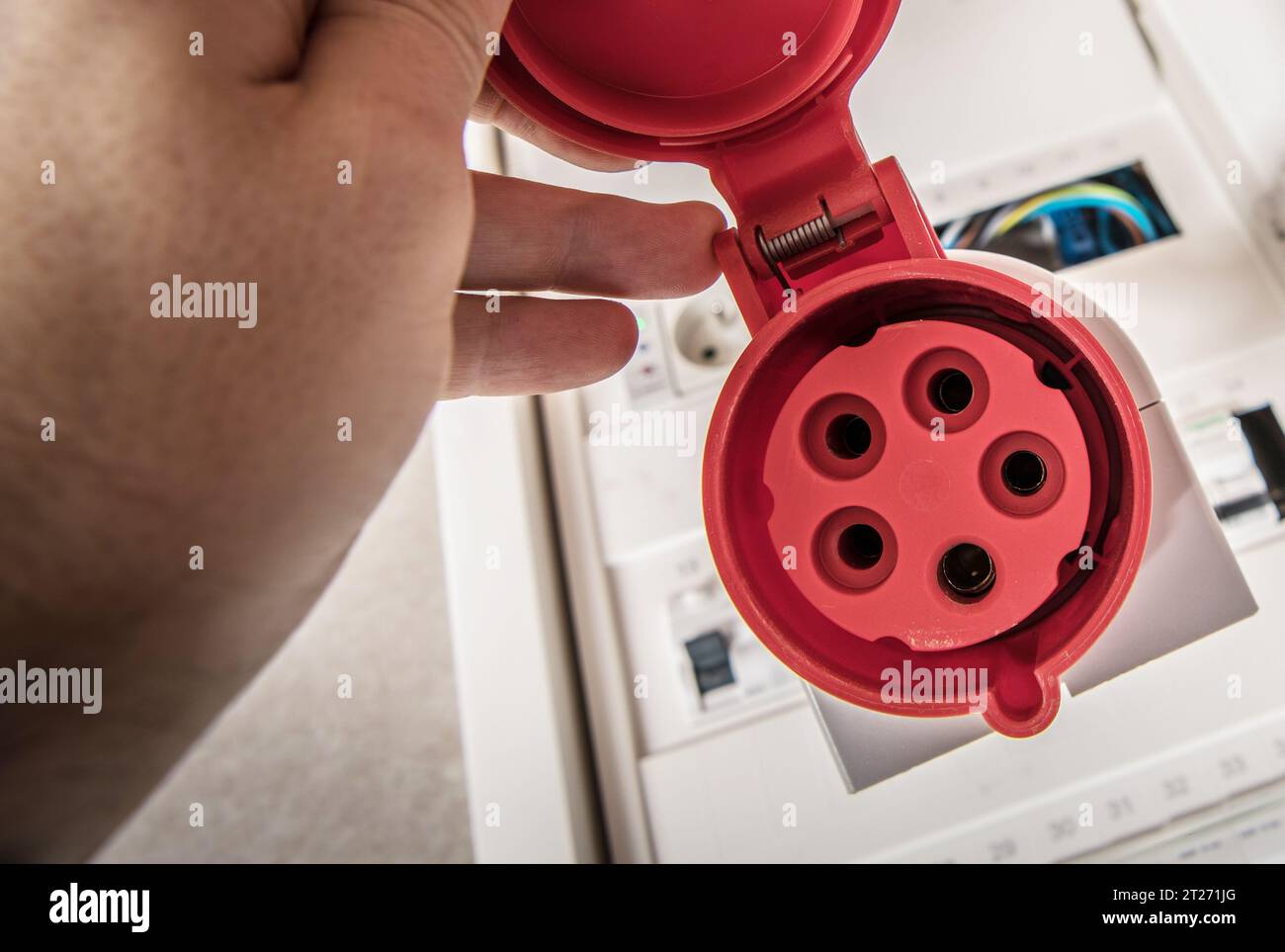 Caucasian Man Opening Red Two Phase Electric Residential Power Outlet ...