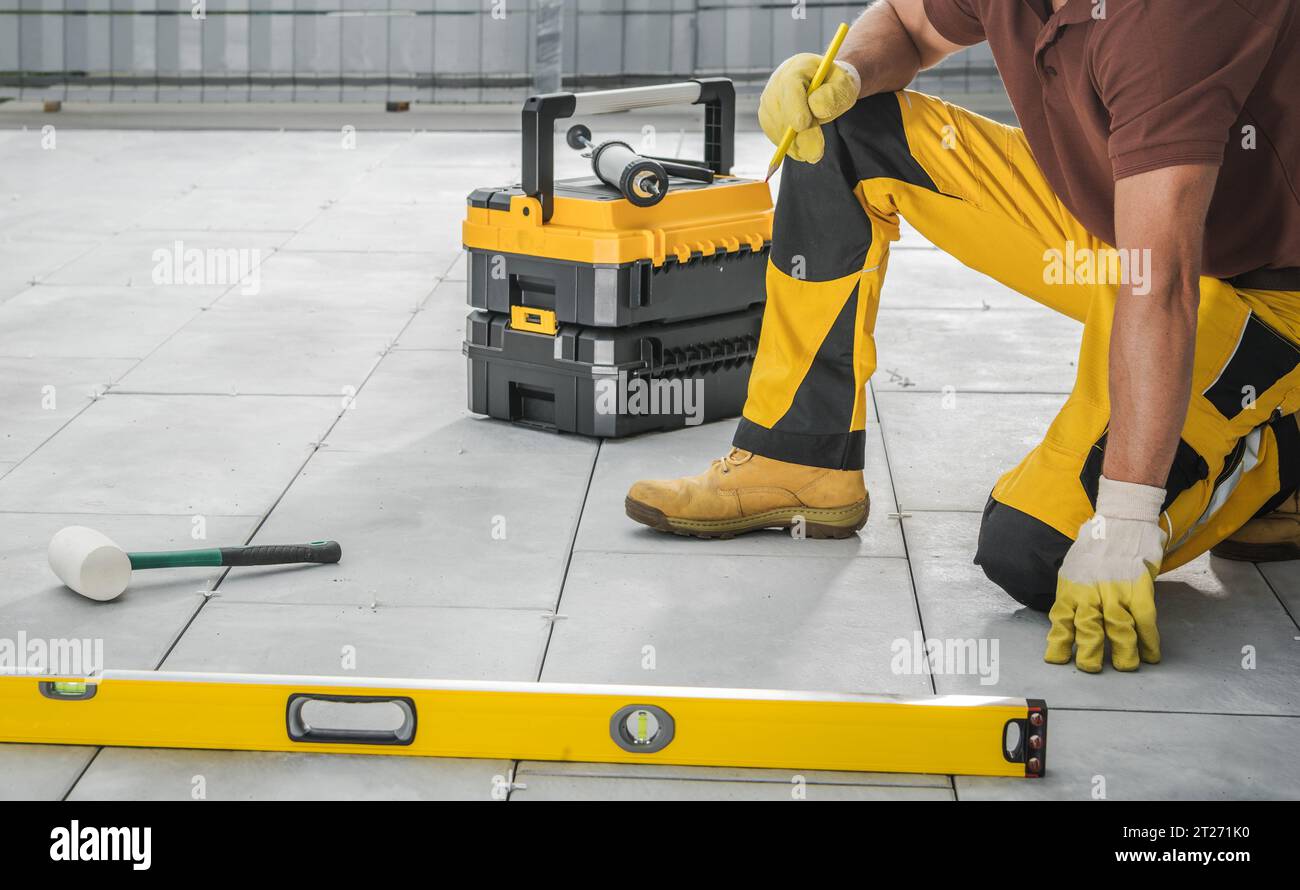 Professional Caucasian Contractor Building Concrete Blocks Patio Floor ...