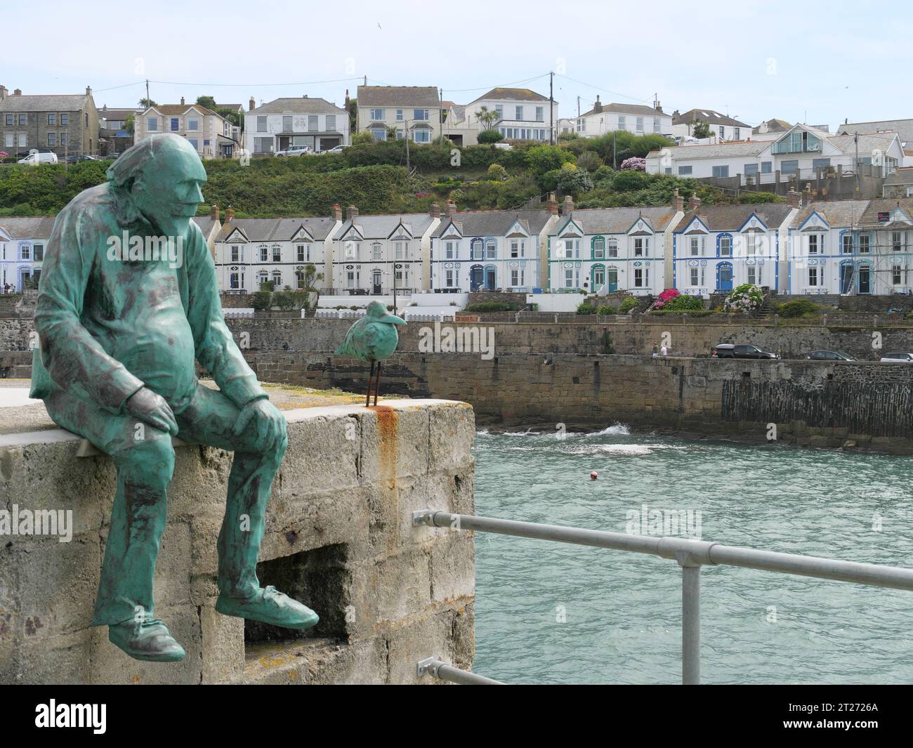 View of typical english row house with bay windows above the harbour of ...