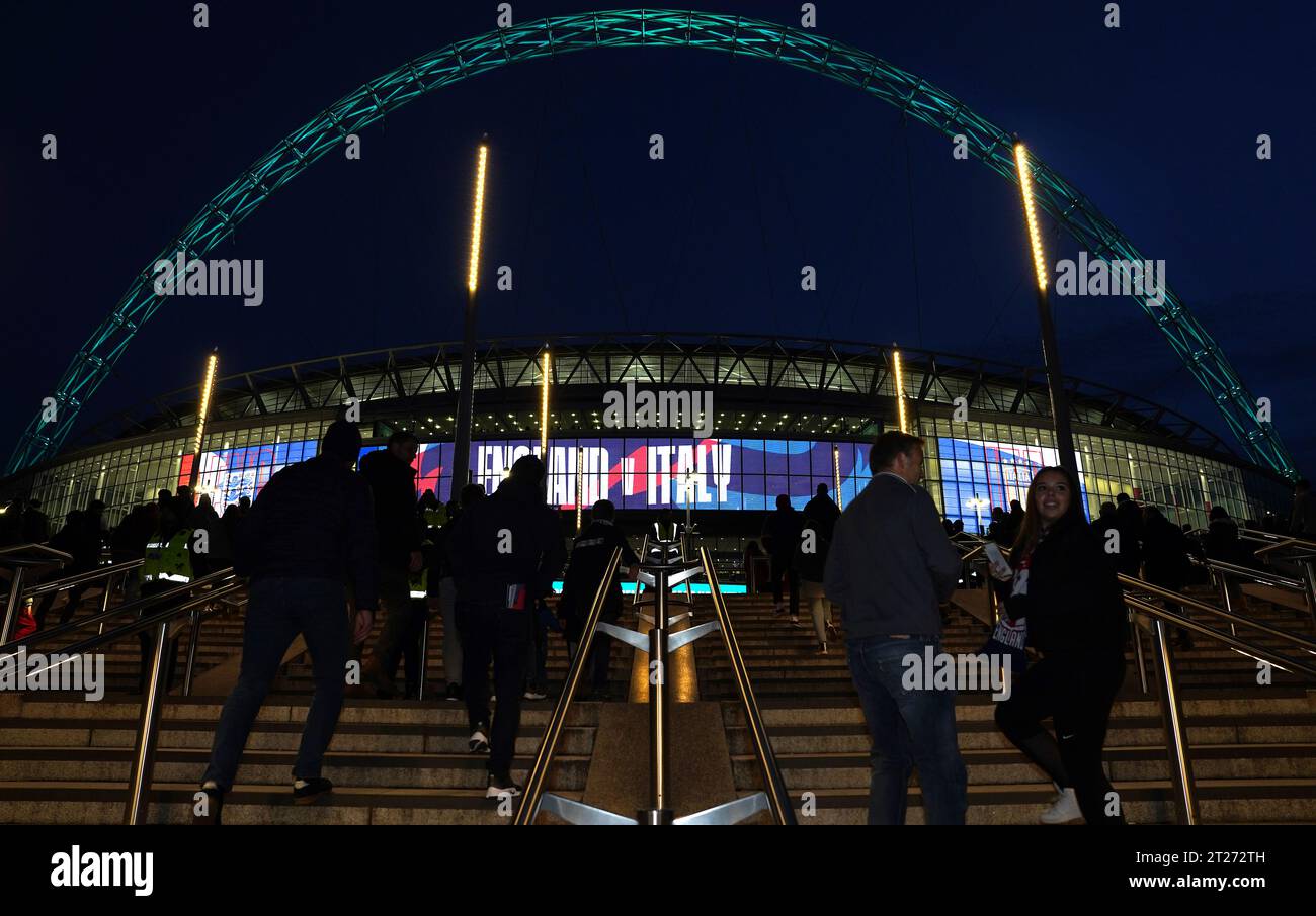 General view of the Wembley arch lit up as fans make their way to the ...