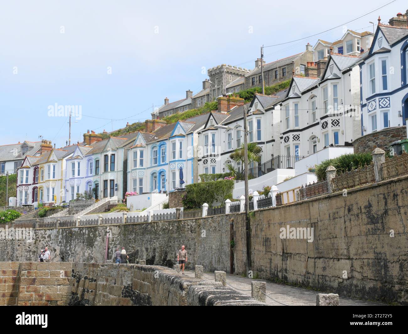 Typical english row house with bay windows above the harbour of ...
