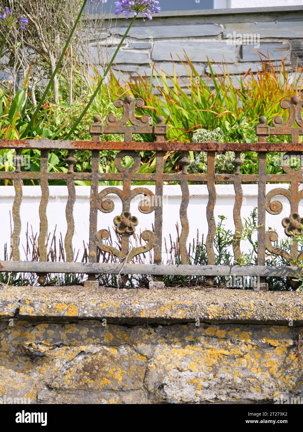 Old rusted wrought iron railing at the harbour of Porthleven in ...