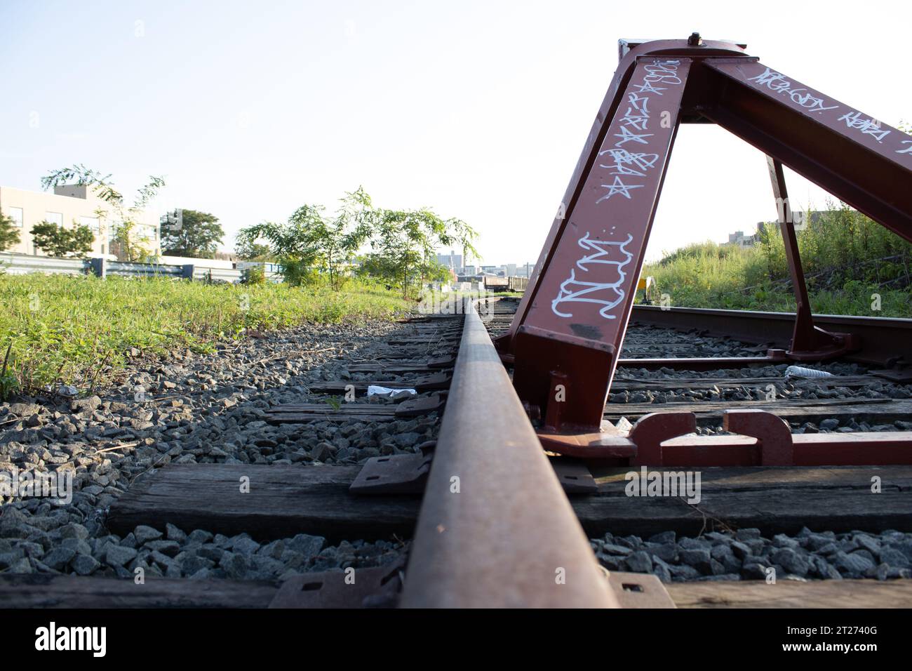 Railroad bumper graffitied Stock Photo - Alamy