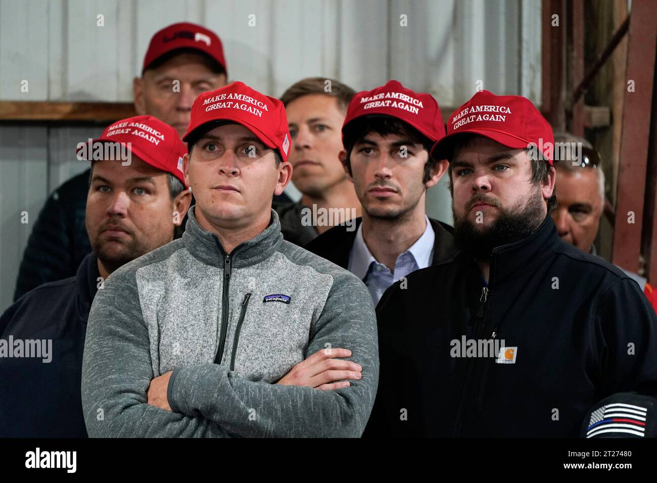 Supporters listen to former President Donald Trump speak during a ...