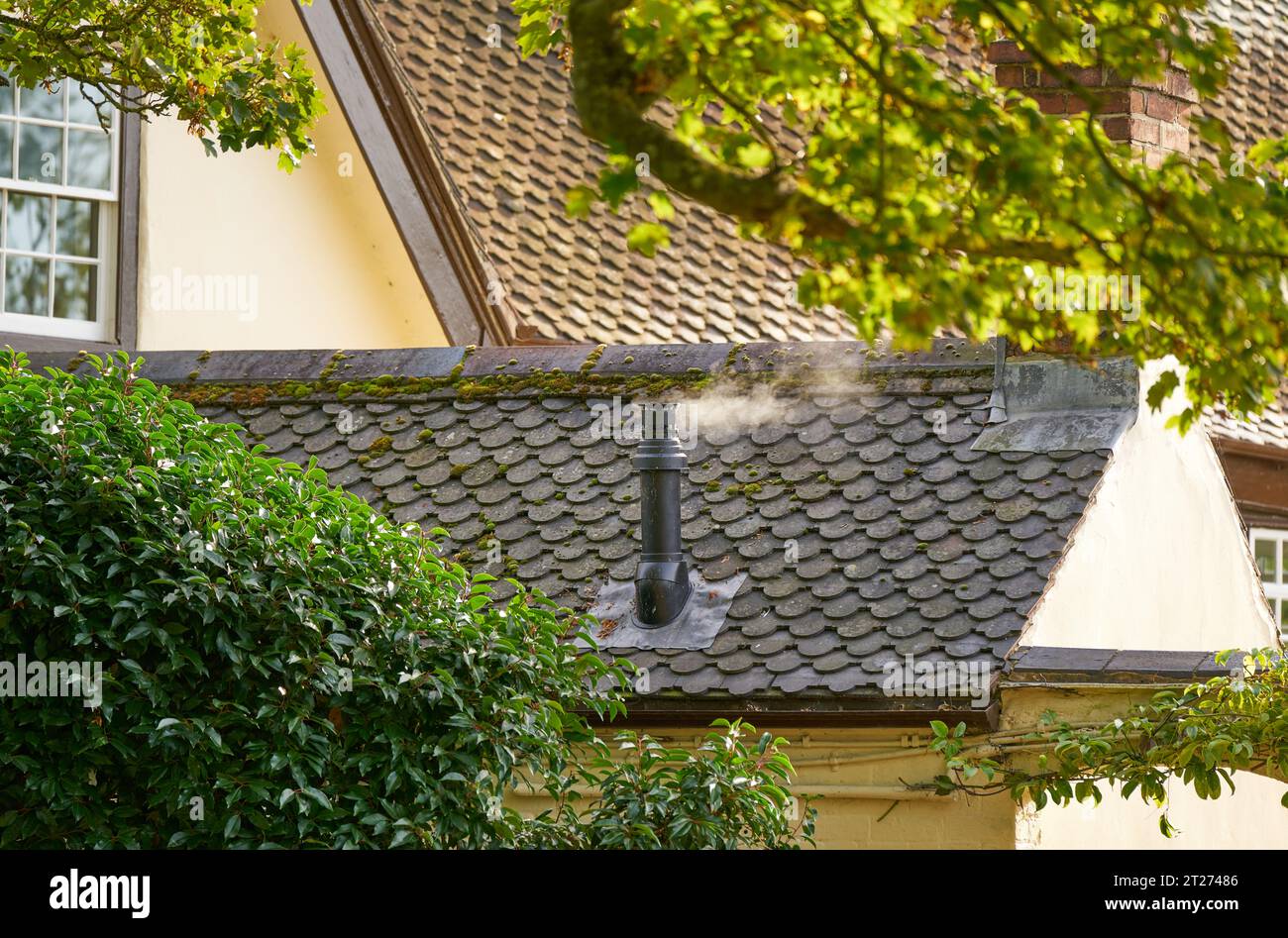 Chimney wood burner house uk hi-res stock photography and images - Alamy