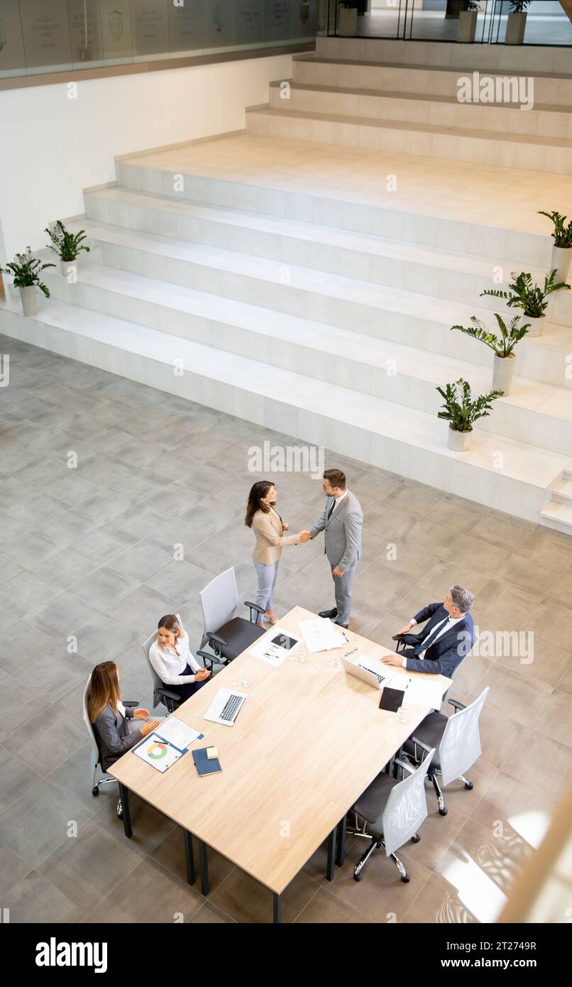 Aerial view young startup team working in the modern office Stock Photo ...