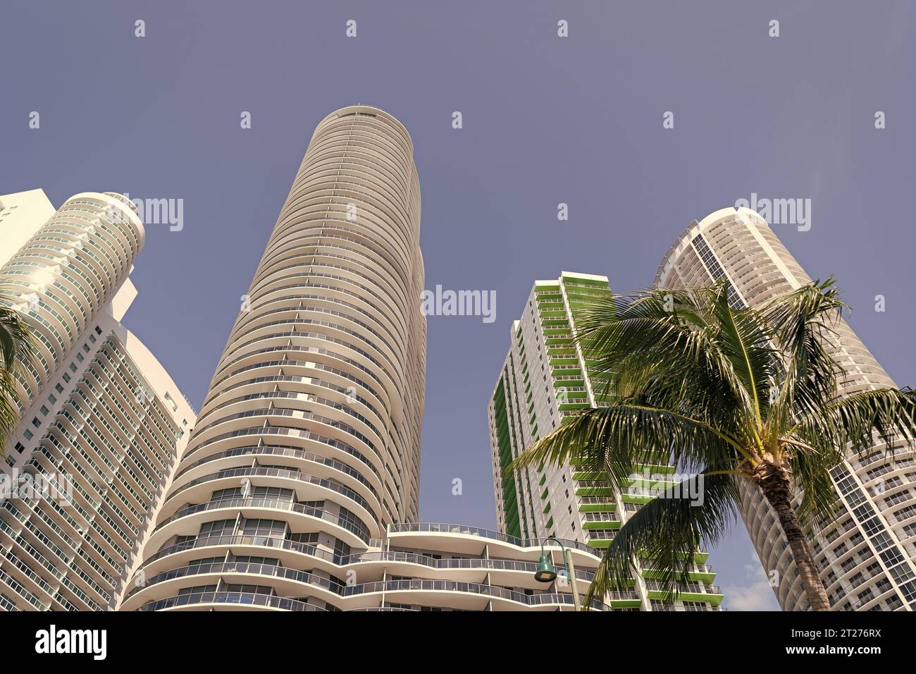 perspective photo of high skyscraper architecture on blue sky ...