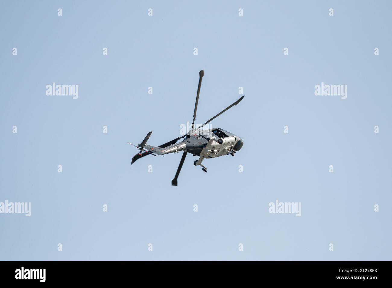 German military deck helicopter Sea Lynx MK 88 A flies at airfield, Berlin, Germany Stock Photo ...
