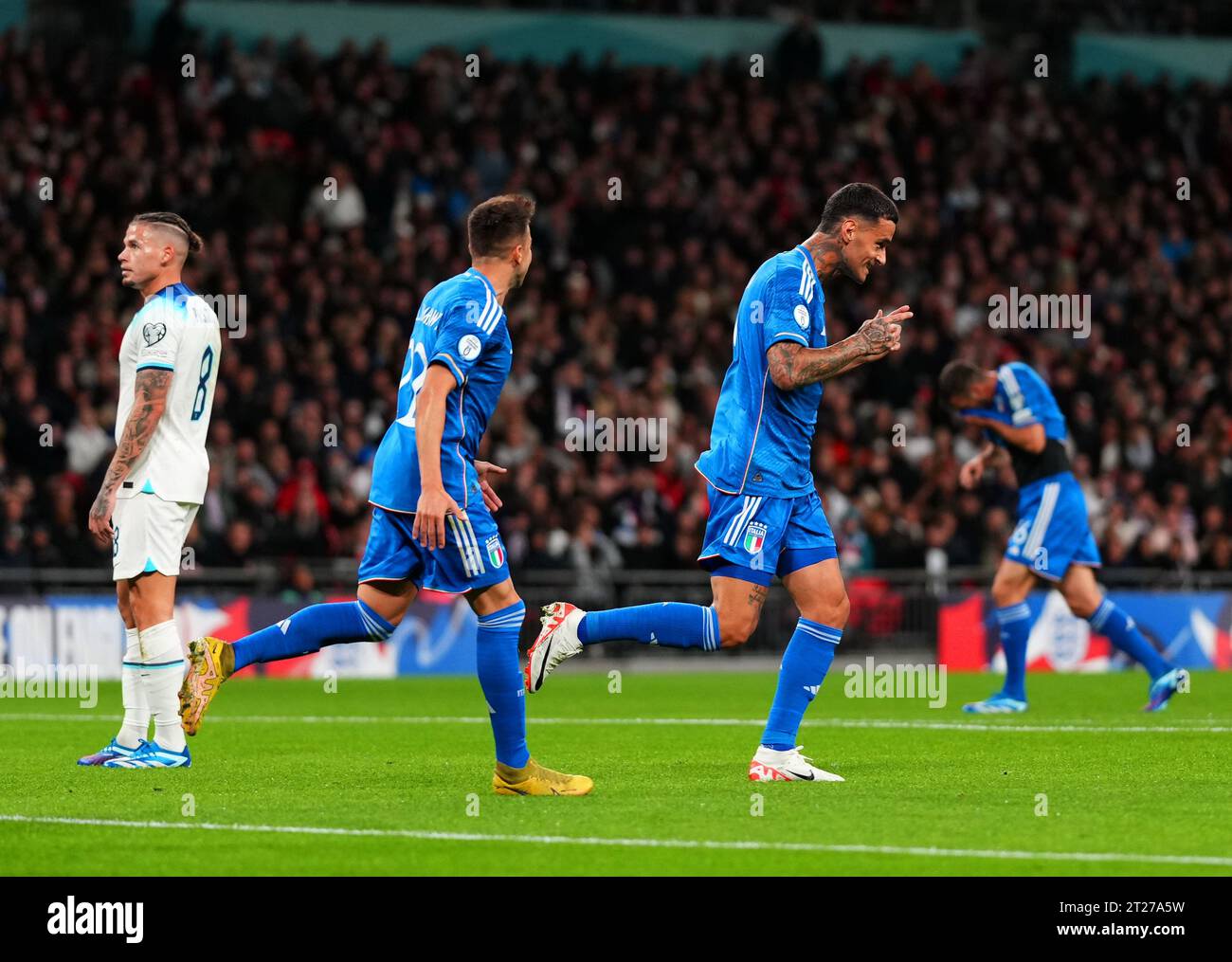 Italy's Gianluca Scamacca (right) celebrates scoring their side's first ...