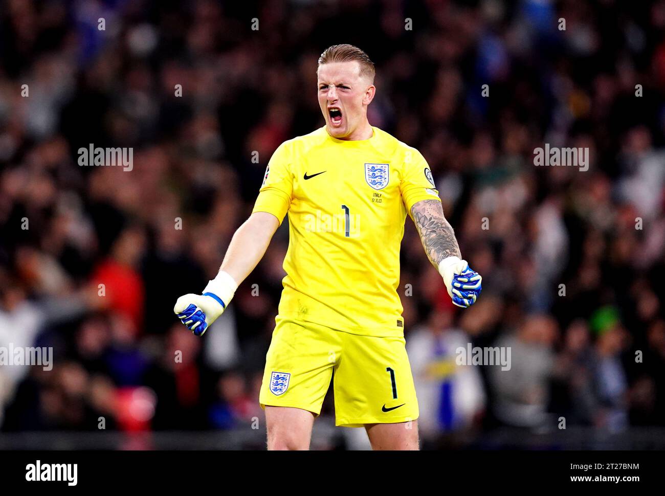 England goalkeeper Jordan Pickford celebrates after his team is awarded ...