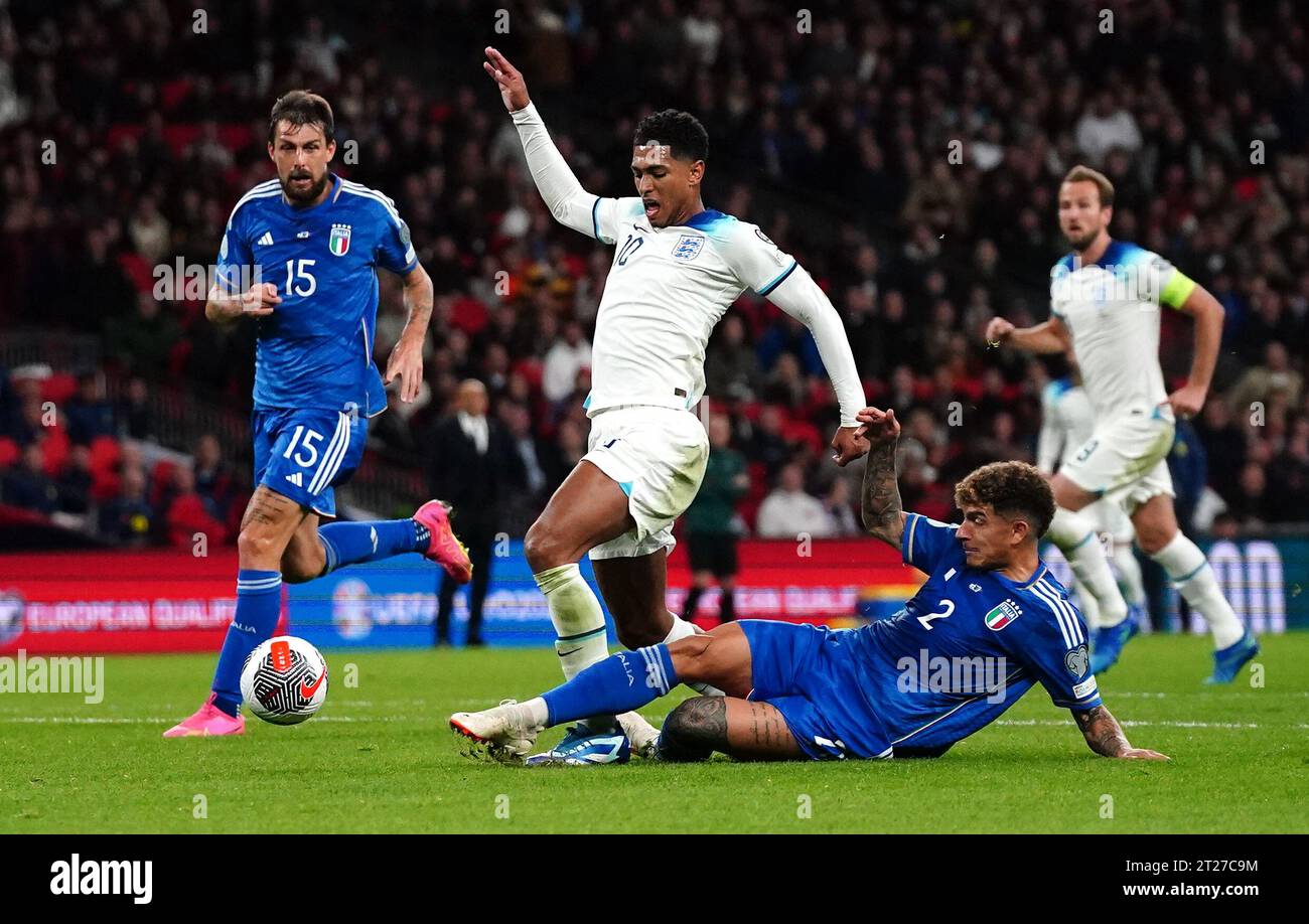 England's Jude Bellingham is fouled by Italy's Giovanni Di Lorenzo ...