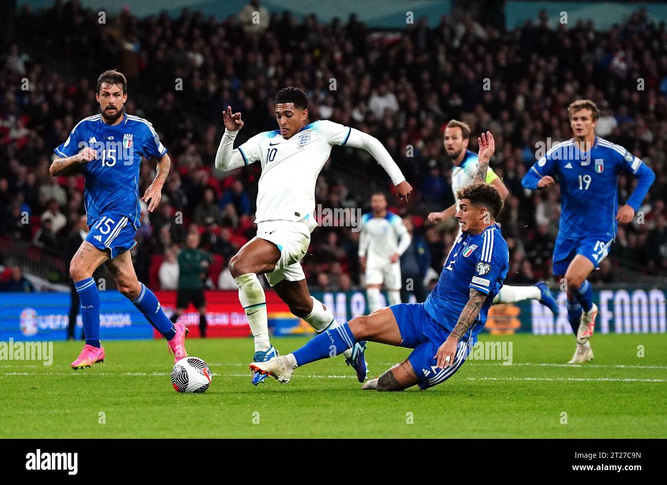England's Jude Bellingham is fouled by Italy's Giovanni Di Lorenzo ...