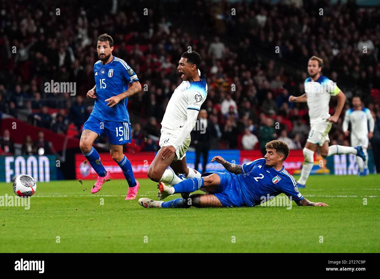 England's Jude Bellingham is fouled by Italy's Giovanni Di Lorenzo ...