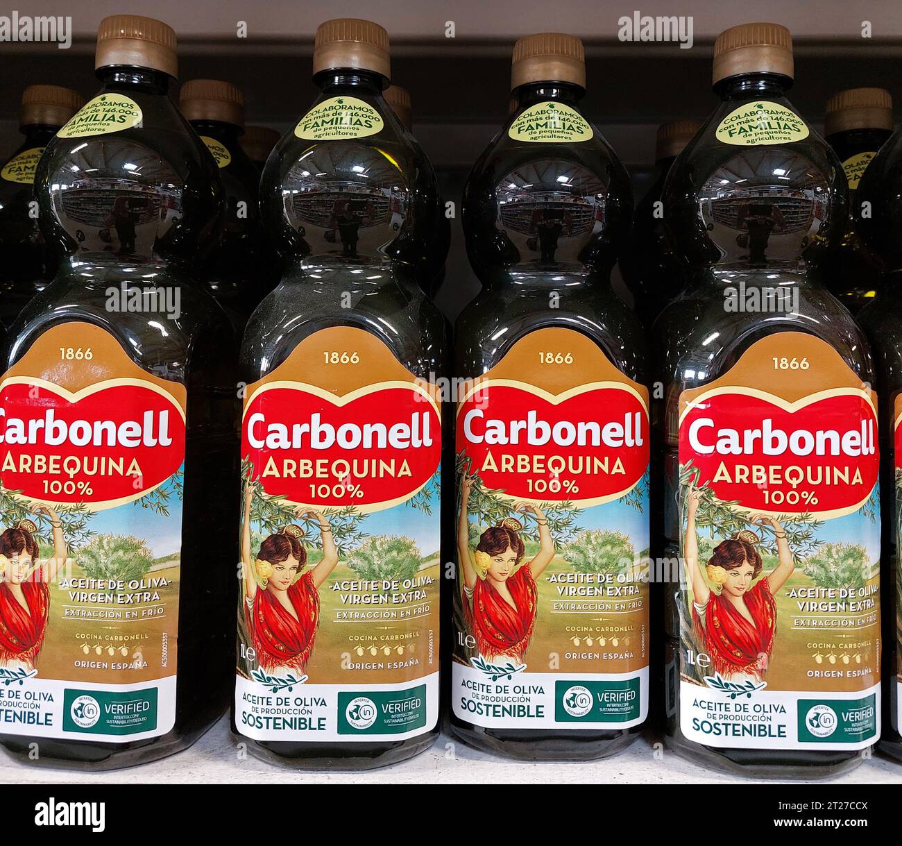 spanish virgen extra Carbonell olive oil bottles in a supermarket Stock ...