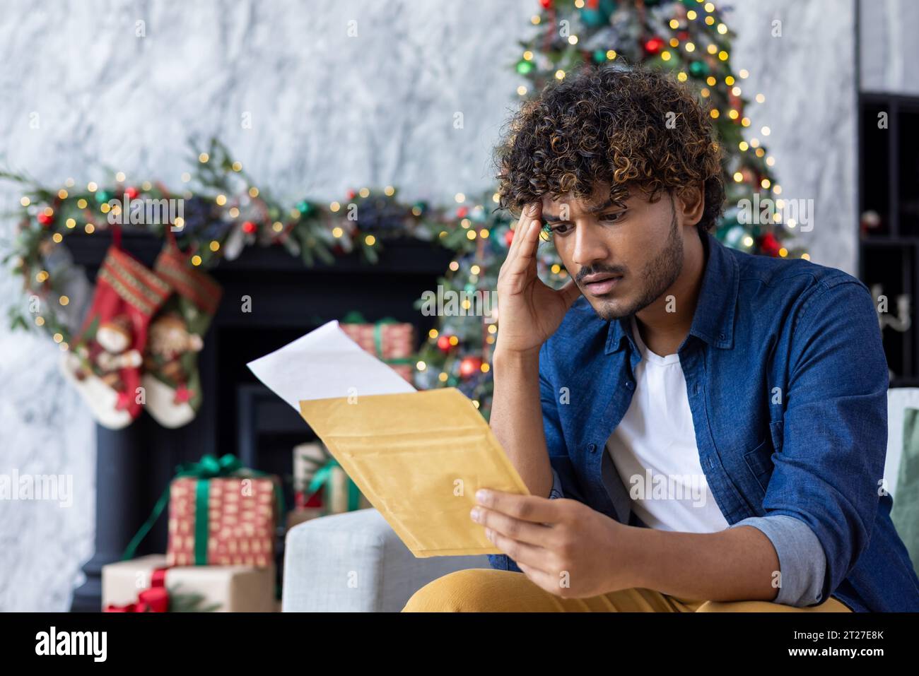 Man received postal envelope letter with bad news, upset disappointed ...