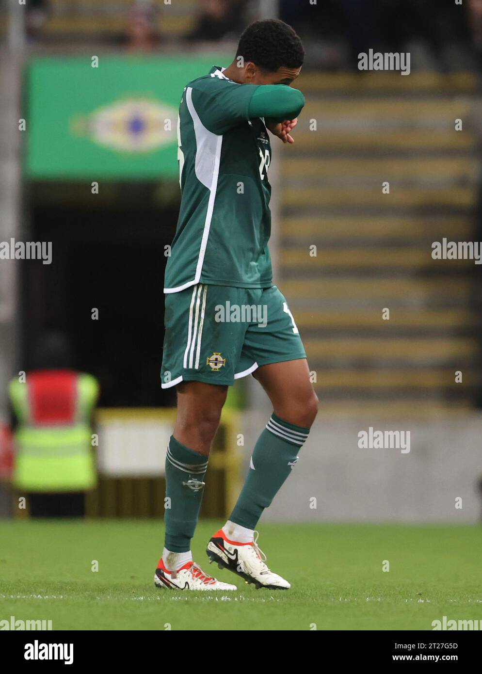 Northern Ireland's Shea Charles reacts after being shown a red card ...