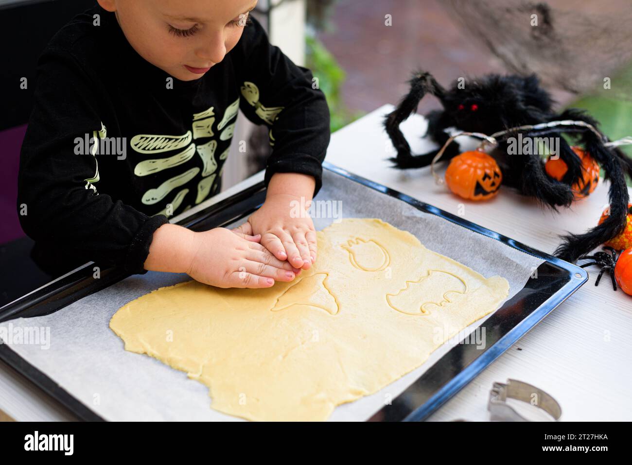 Halloween kid skeleton eating hi-res stock photography and images - Alamy