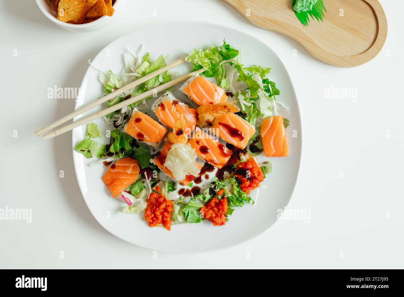 Top view of Japanese sushi. Rolls with tuna, salmon, shrimp, crab and ...
