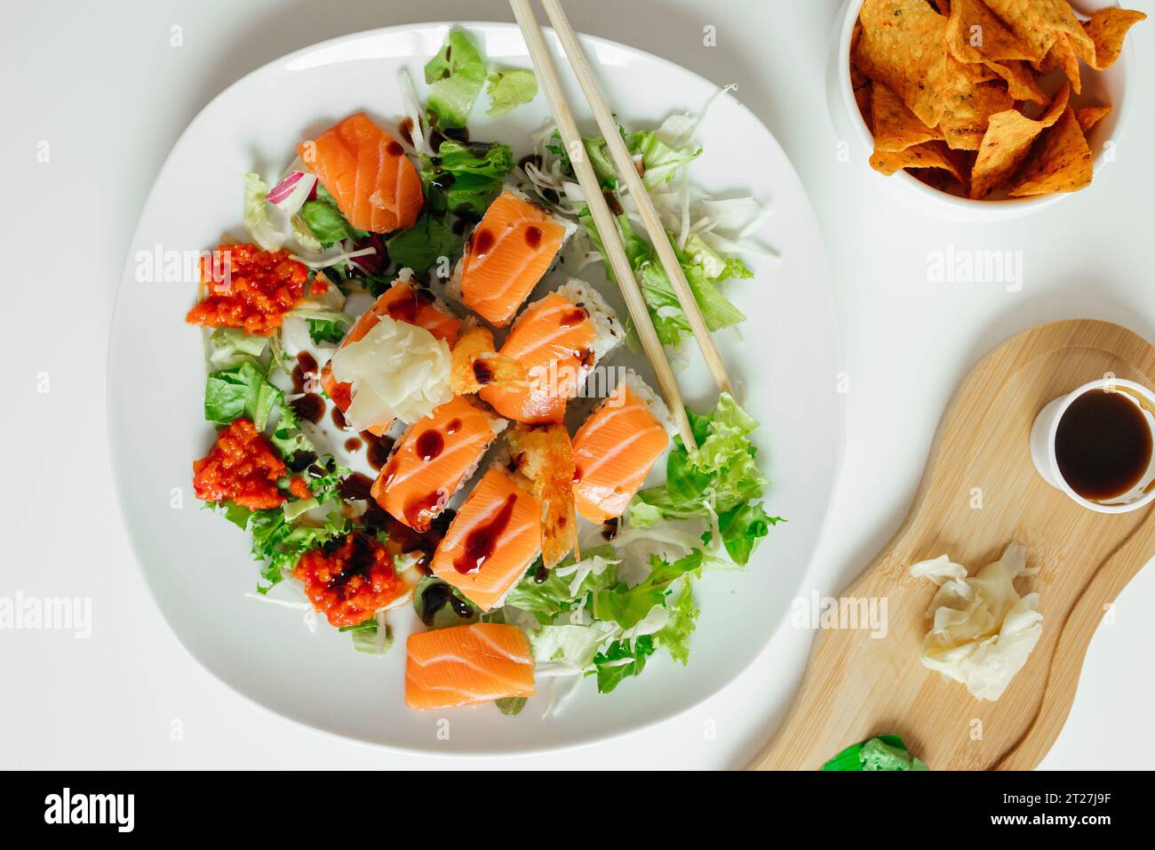 Top view of Japanese sushi. Rolls with tuna, salmon, shrimp, crab and ...