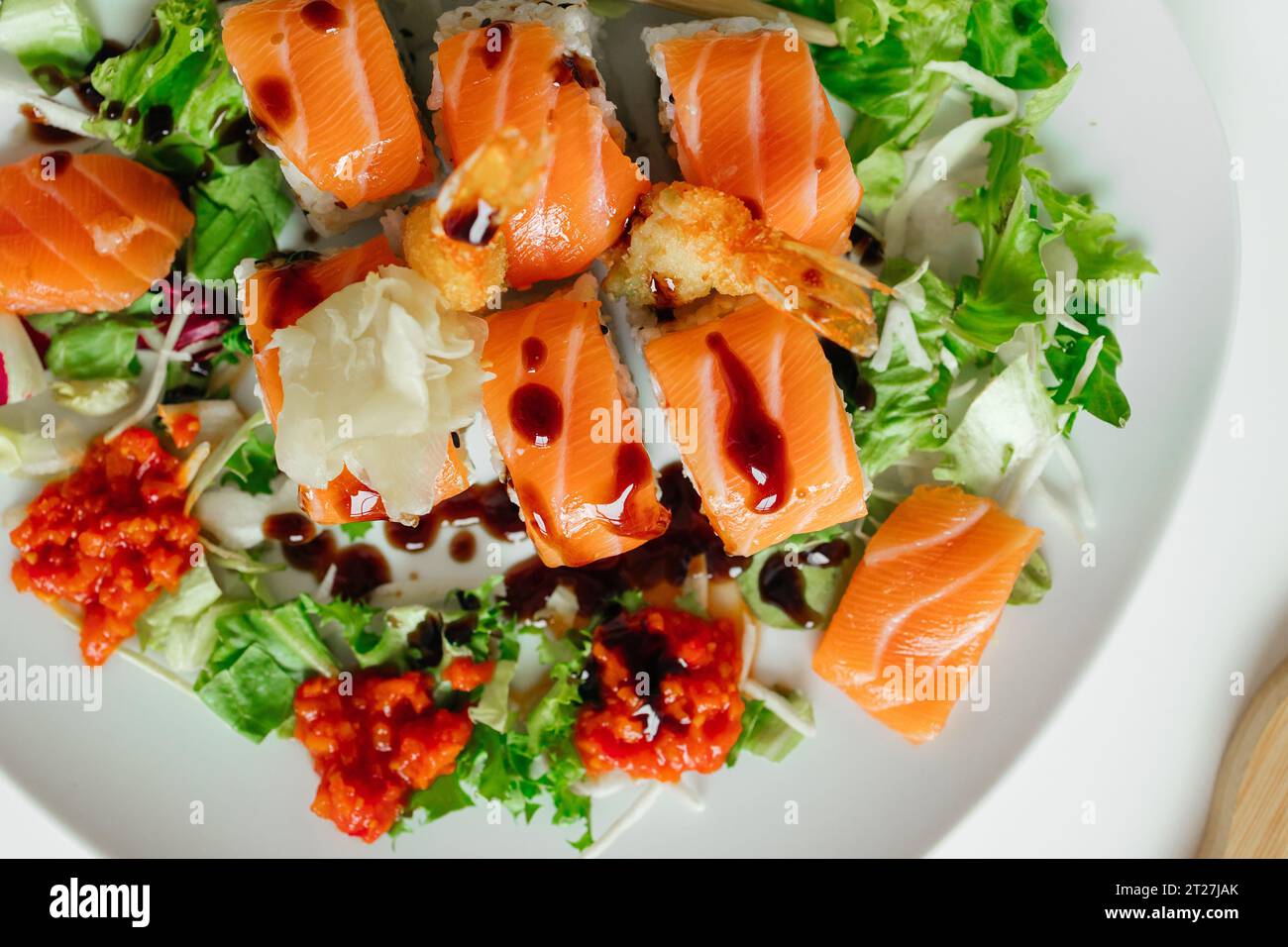 Top view of Japanese sushi. Rolls with tuna, salmon, shrimp, crab and ...