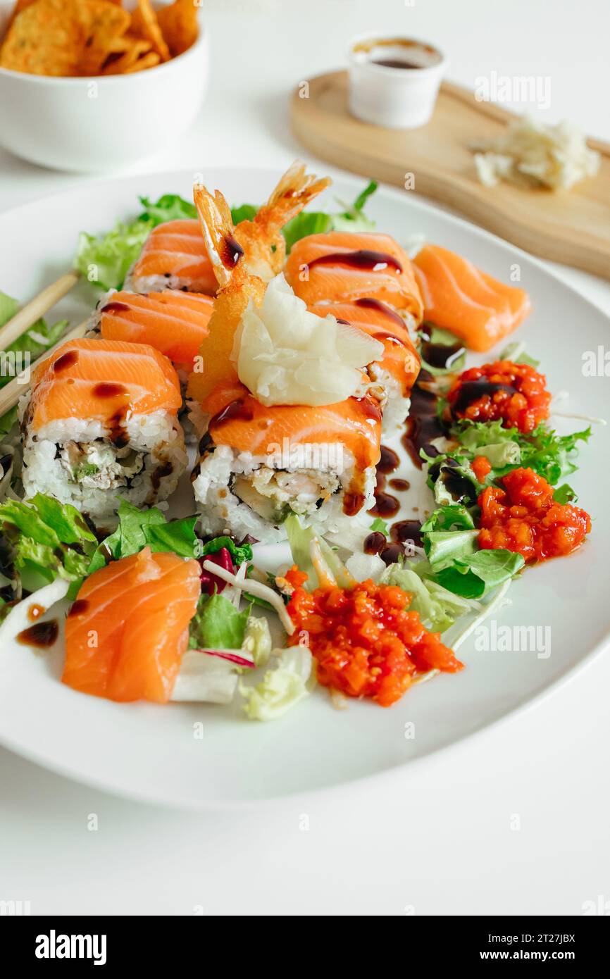 Top view of Japanese sushi. Rolls with tuna, salmon, shrimp, crab and ...