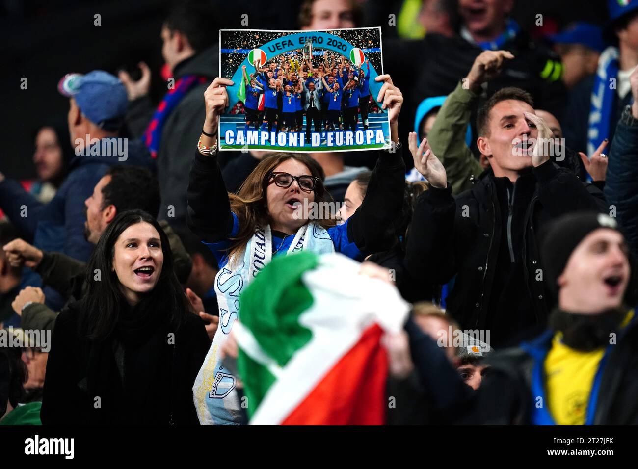 Italy fans hold up a photo of the Italy team winning the UEFA Euro 2020 ...
