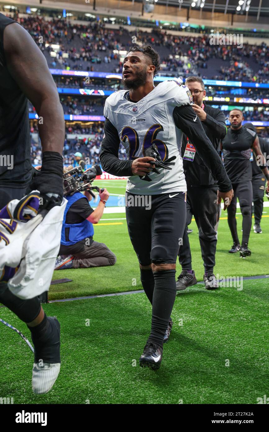Baltimore Ravens safety Geno Stone (26) walks off the field after an ...