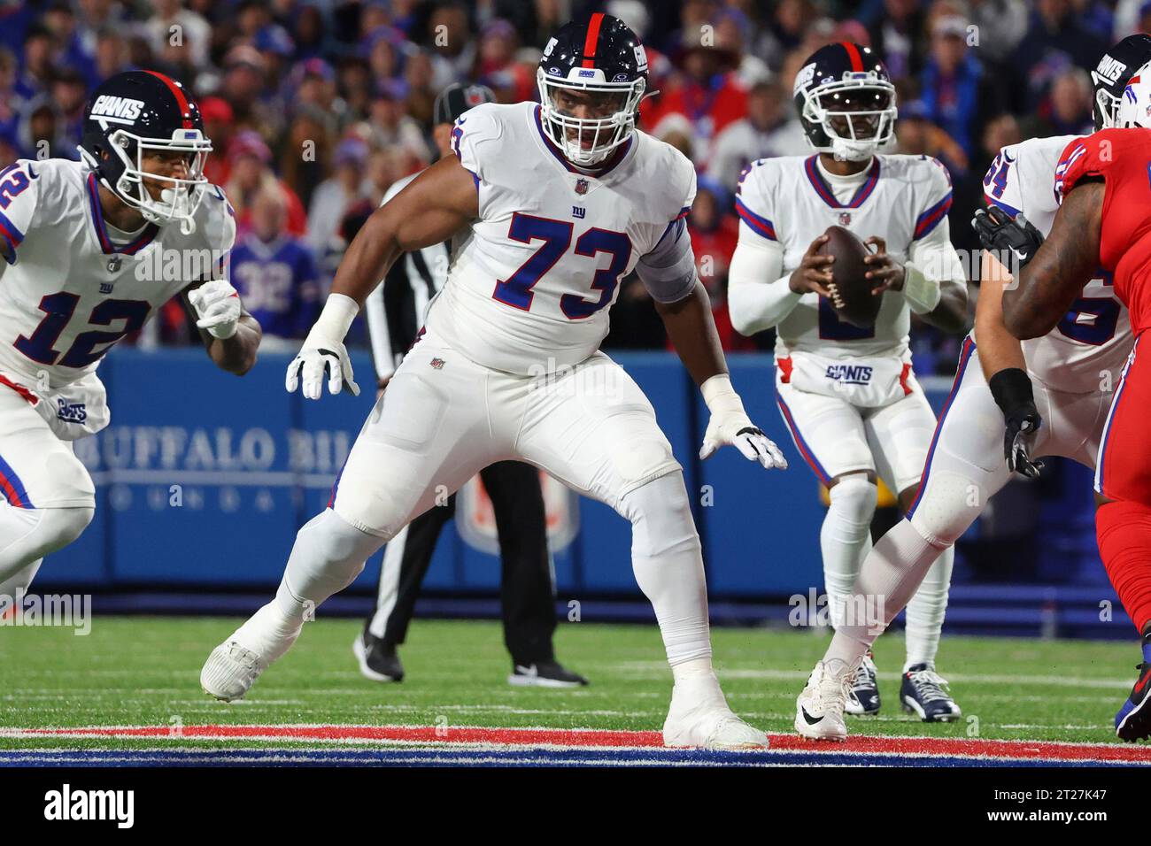 New York Giants offensive tackle Evan Neal (73) gets set to block ...