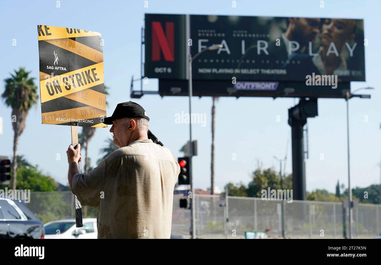 Striking actor Dave Nolan demonstrates outside Netflix studios, Tuesday ...