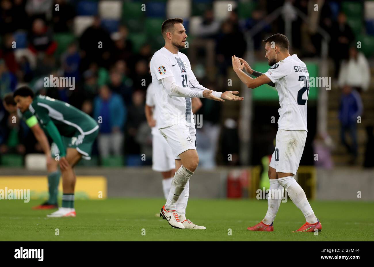 Slovenia’s Timi Elsnik (left) and Petar Stojanovic reacts following the ...