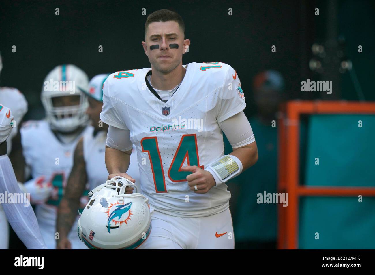 Miami Dolphins quarterback Mike White heads onto the field before the ...
