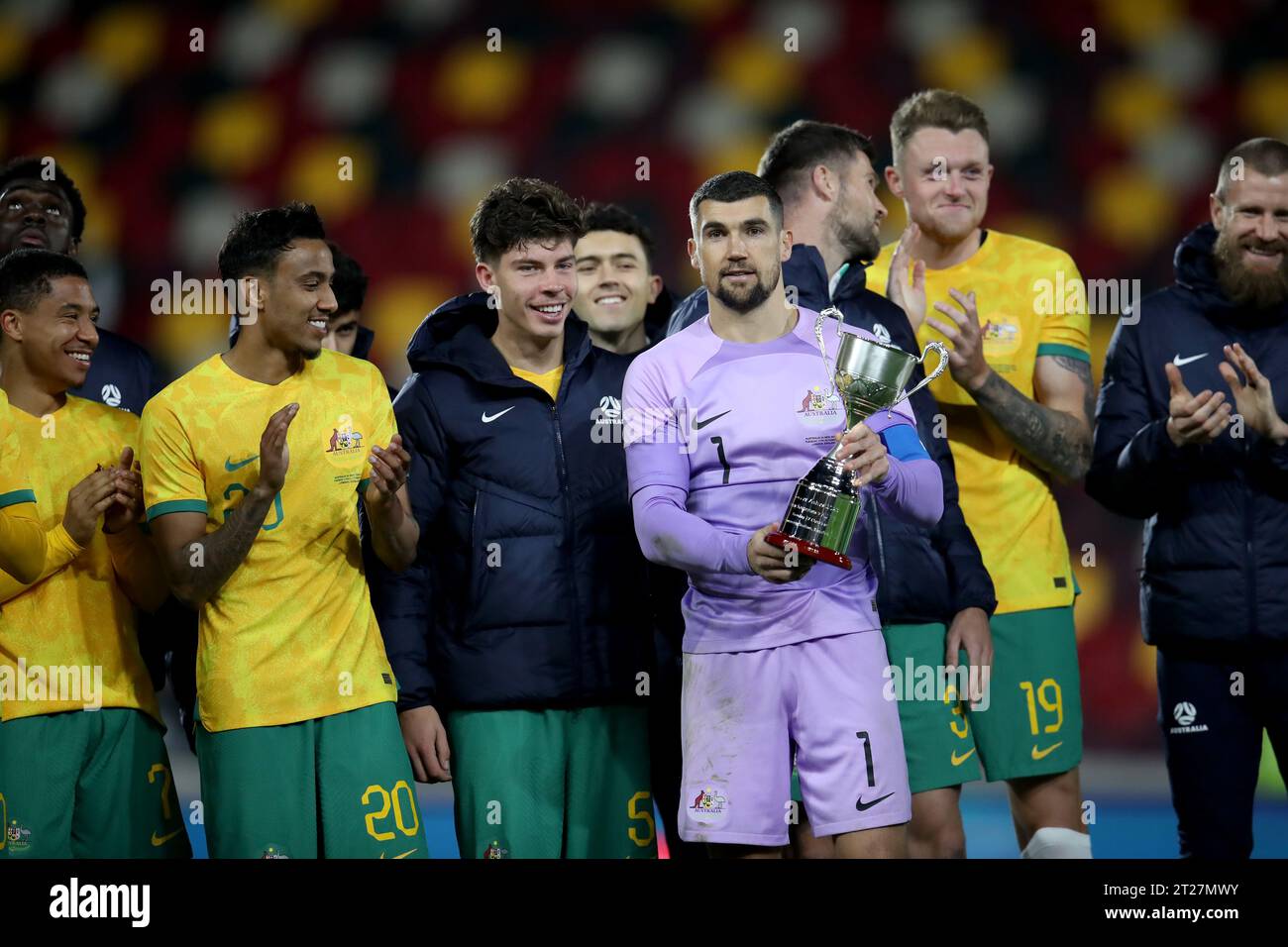 Australia goalkeeper Matthew Ryan and his team mates pose with their ...