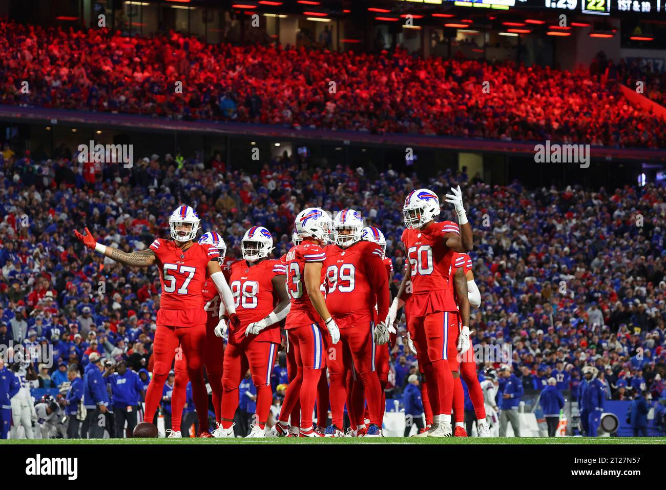 Buffalo Bills players react during the first half of an NFL football ...