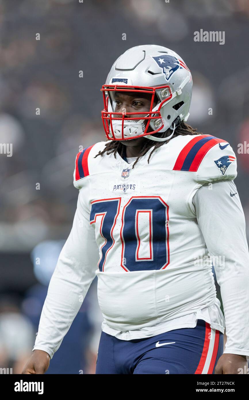 New England Patriots defensive lineman Jeremiah Pharms, Jr. (70) warms ...