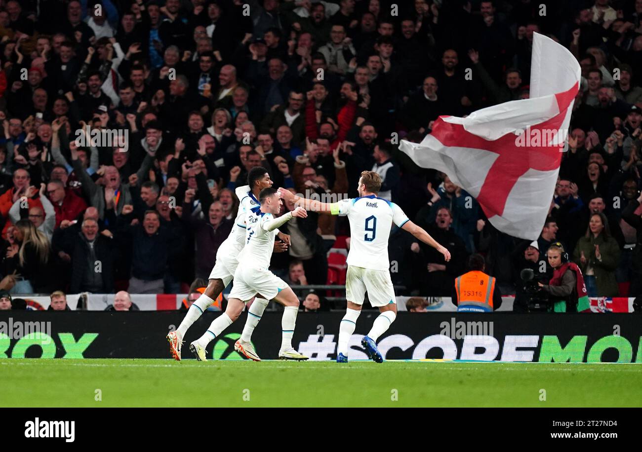 England's Marcus Rashford (left) celebrates scoring their side's second ...