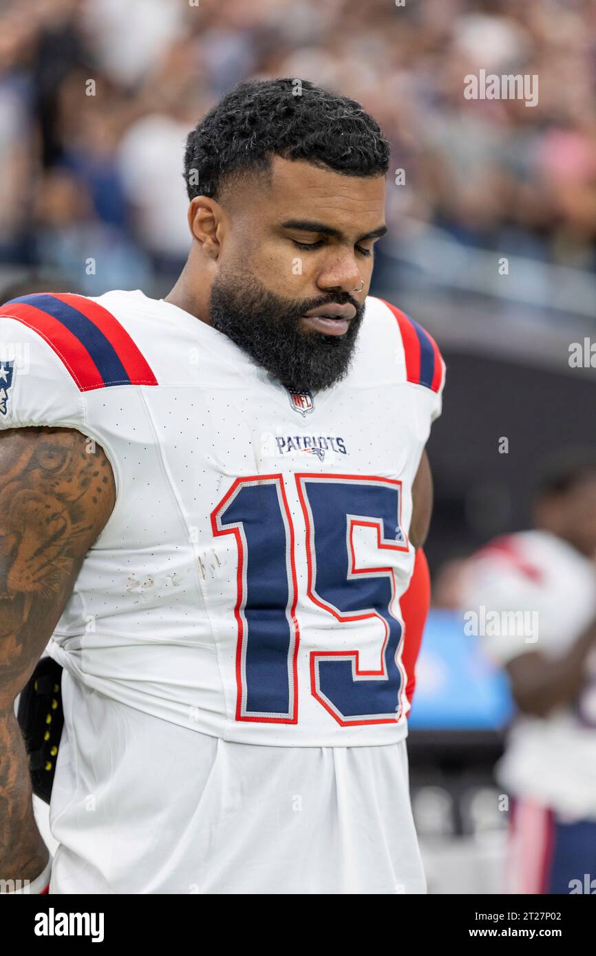 New England Patriots running back Ezekiel Elliott (15) stands for the ...