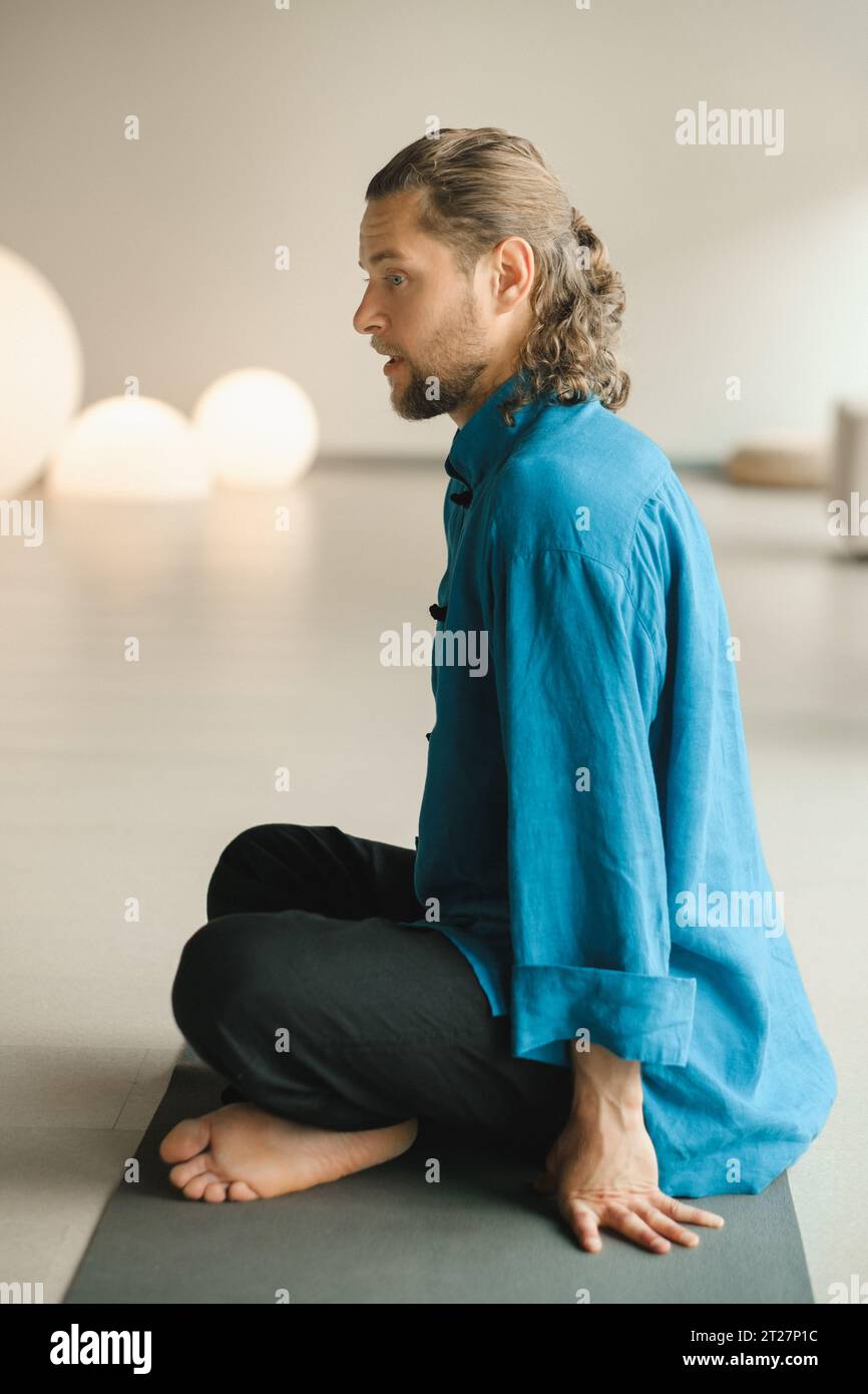 Yoga coach conducts a class in the fitness room Stock Photo - Alamy