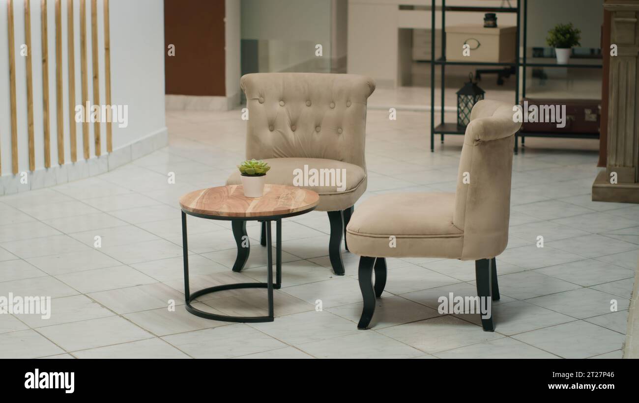 Lounge area with luxury armchairs in hotel decorated with modern ...