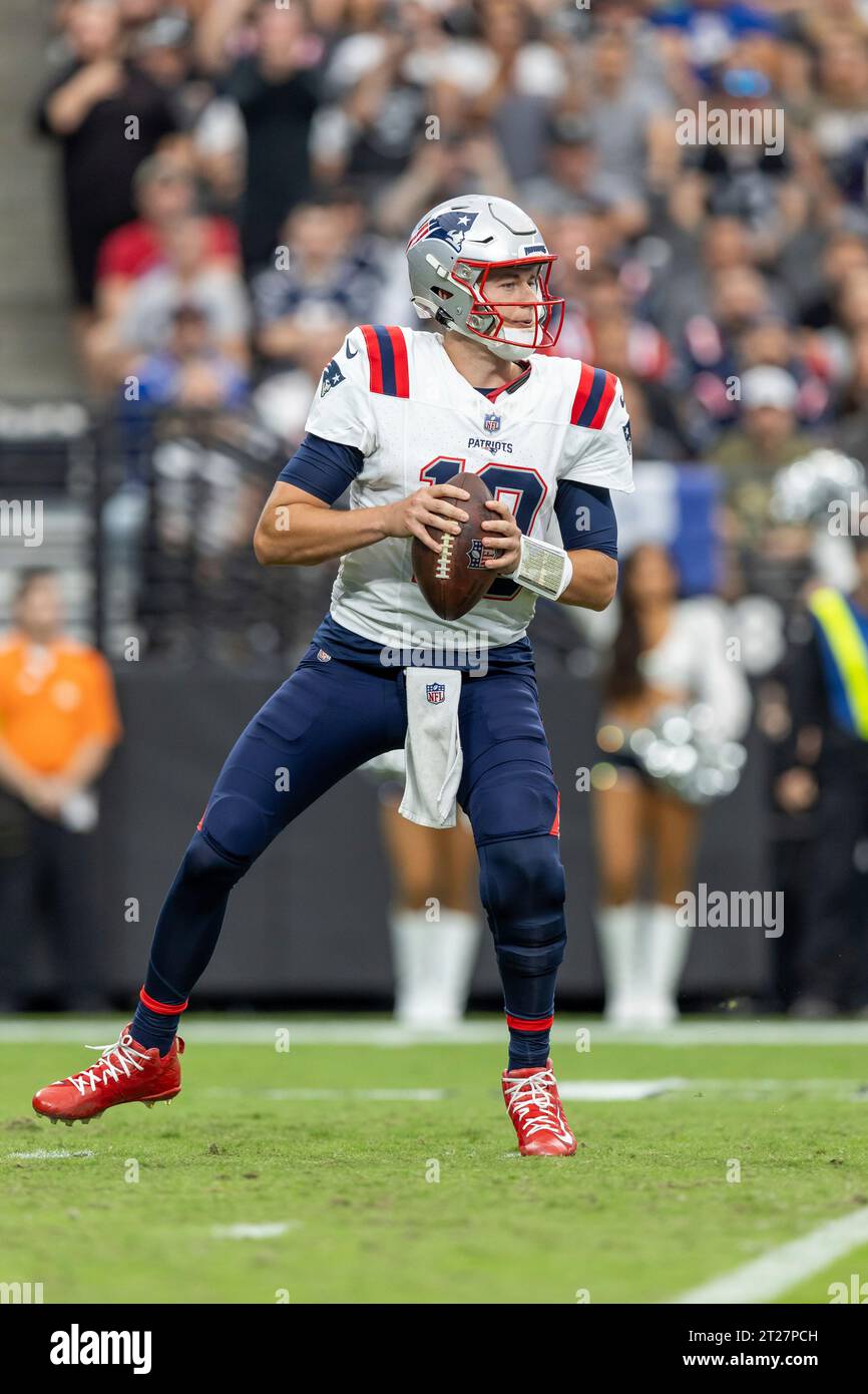 New England Patriots quarterback Mac Jones (10) drops back to pass ...