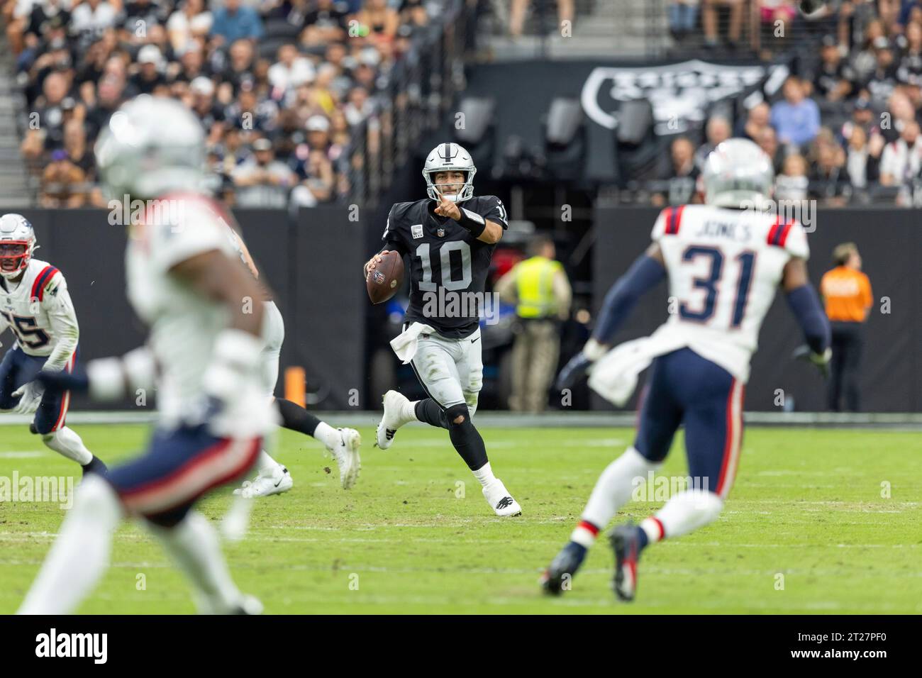Las Vegas Raiders quarterback Jimmy Garoppolo (10) looks to pass ...