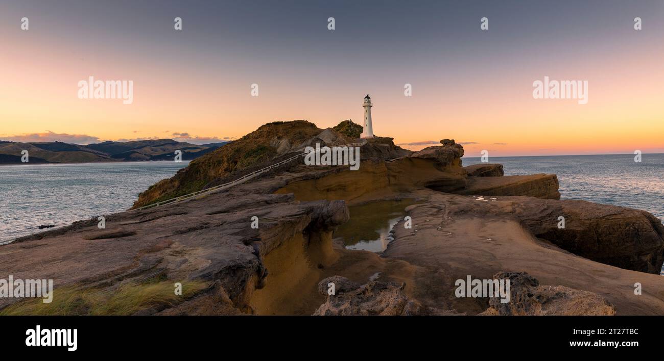 Castlepoint lighthouse, Wairarapa, New Zealand at sunrise Stock Photo - Alamy