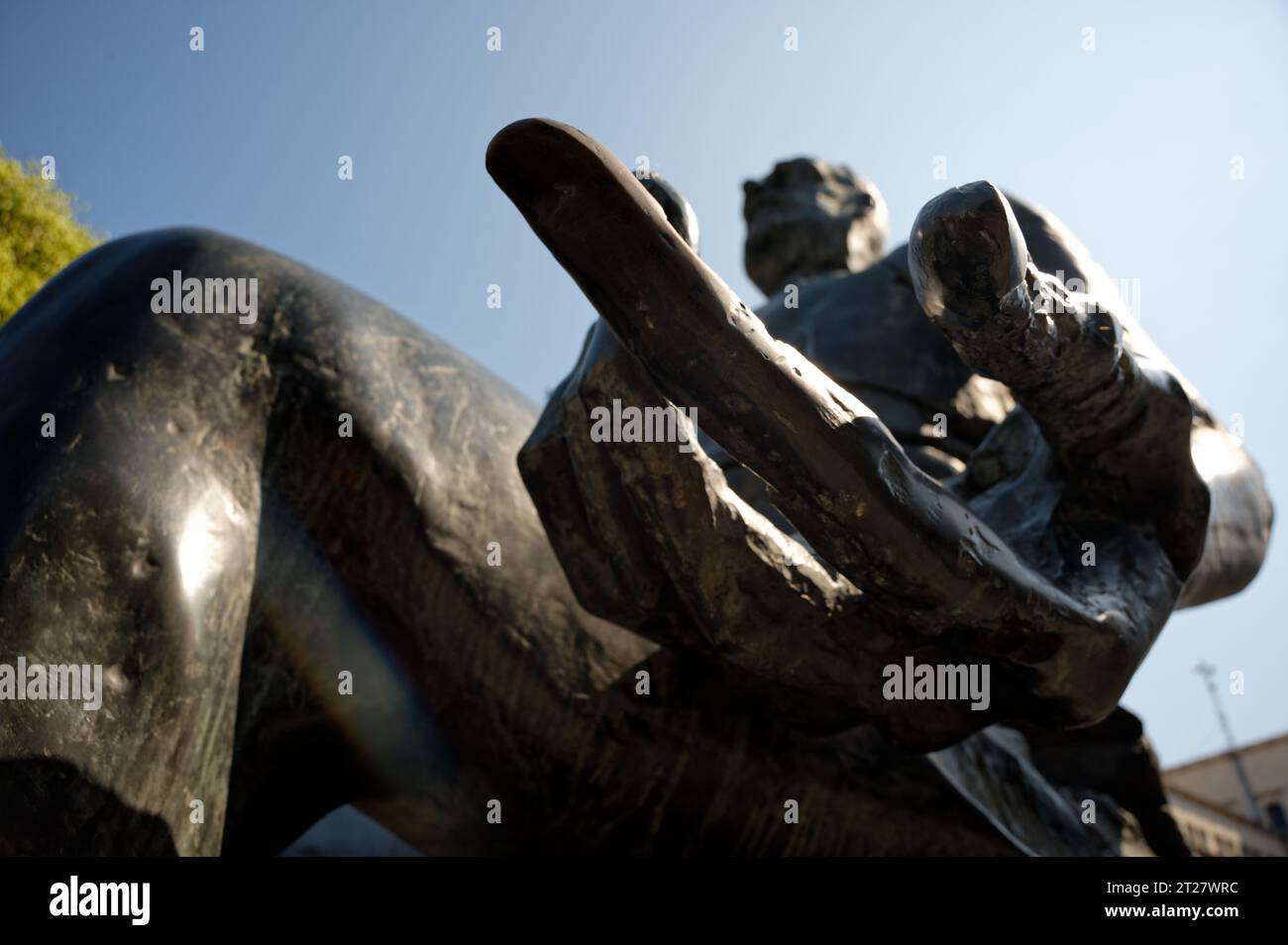 Rugged hands of the statue of Iuliu Maniu in the Revolution Square ...