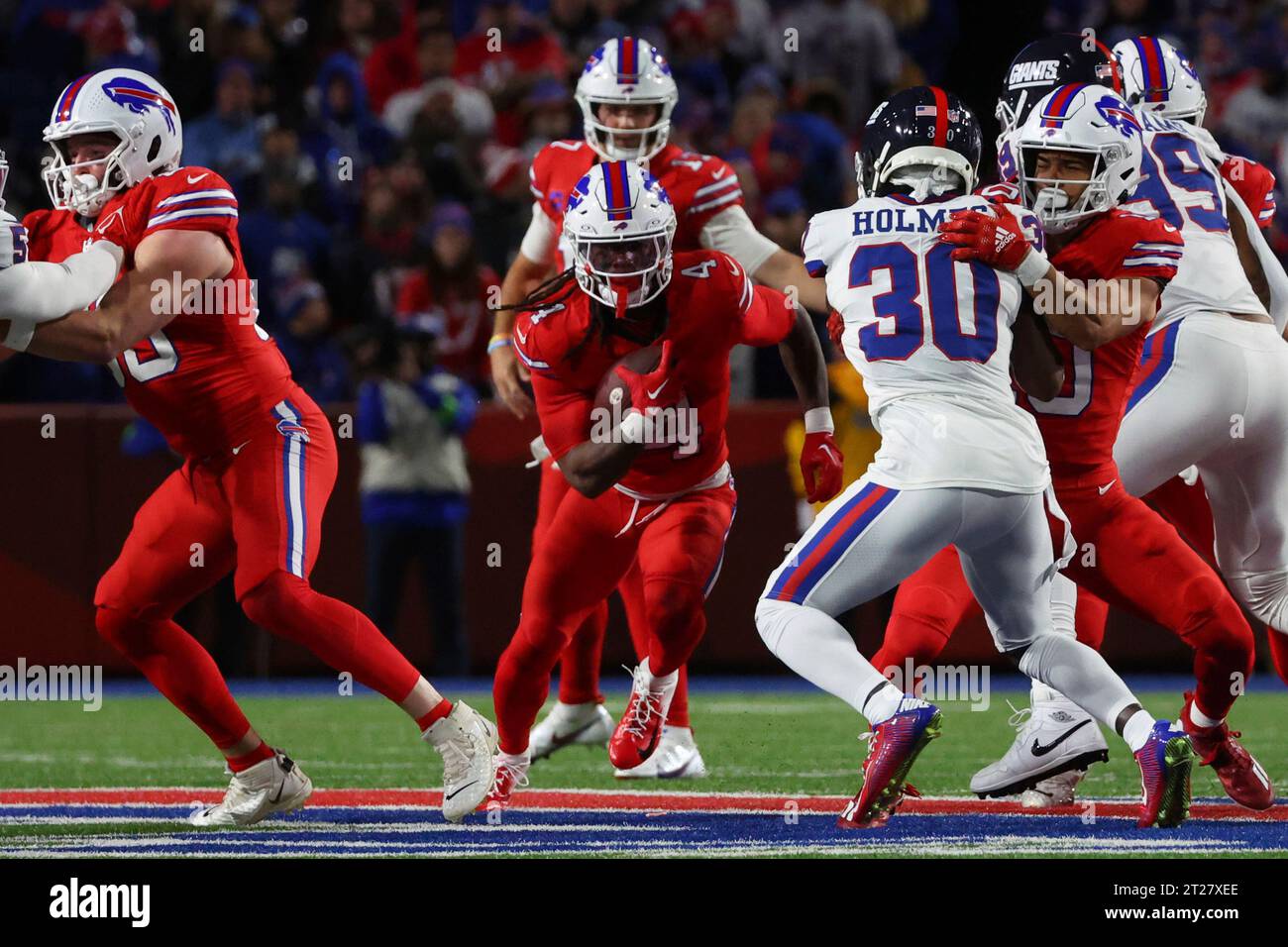 Buffalo Bills running back James Cook (4) carries the ball during the ...