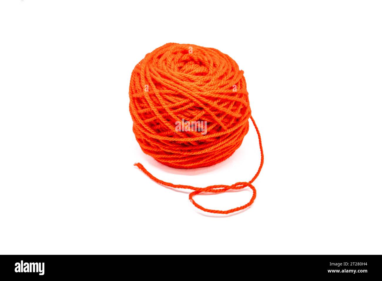 Beautiful bright orange wool on a light background Stock Photo - Alamy